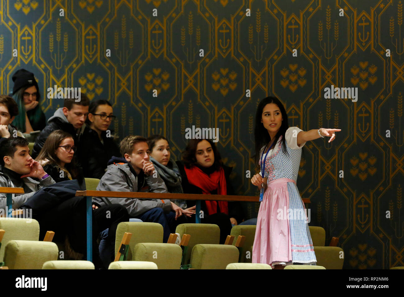 United Nations. 20th Feb, 2019. A United Nations tour guide (R) dressed ...
