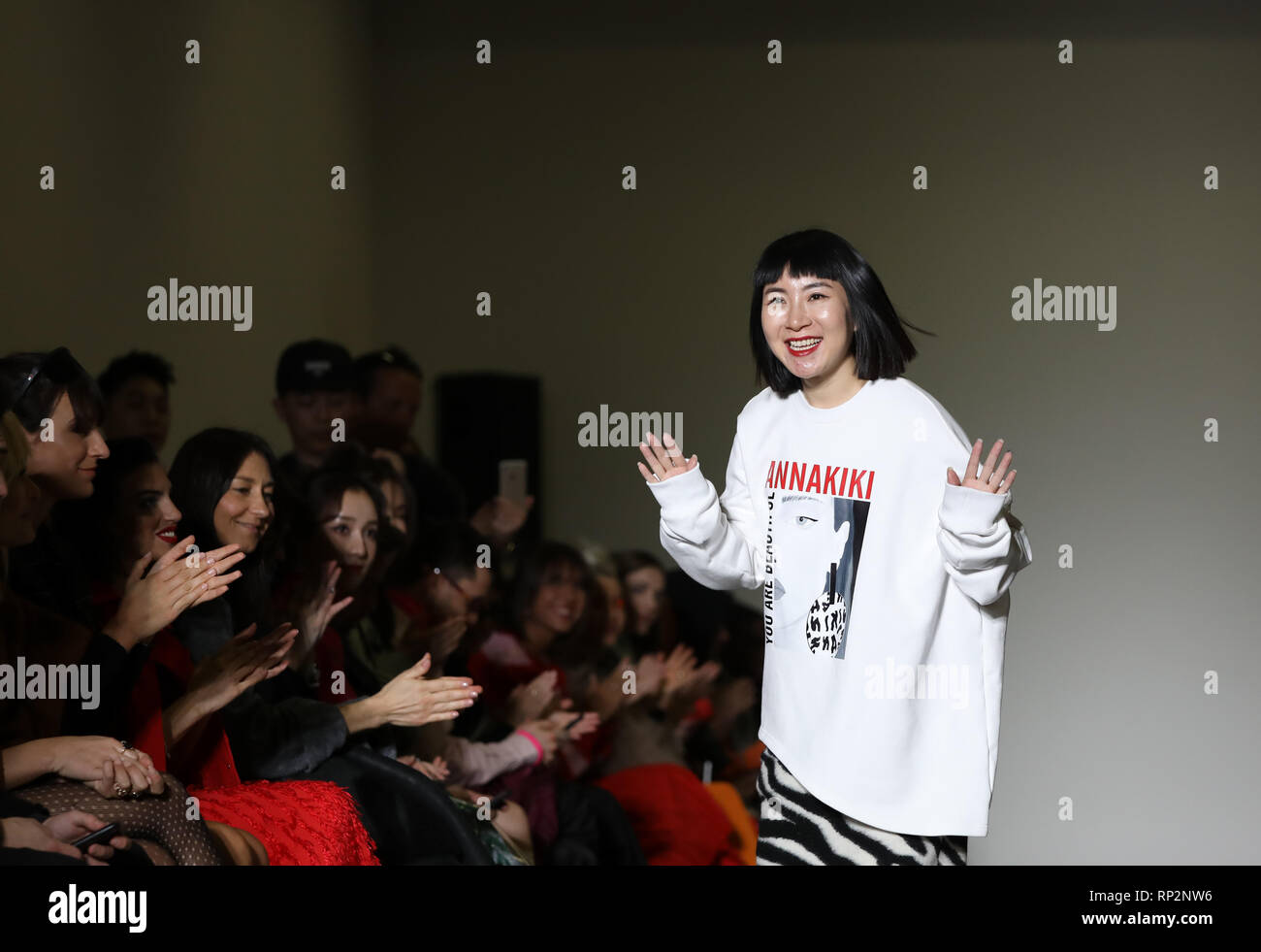 Milan, Italy. 20th Feb, 2019. Designer Anna Yang greets the audience ...