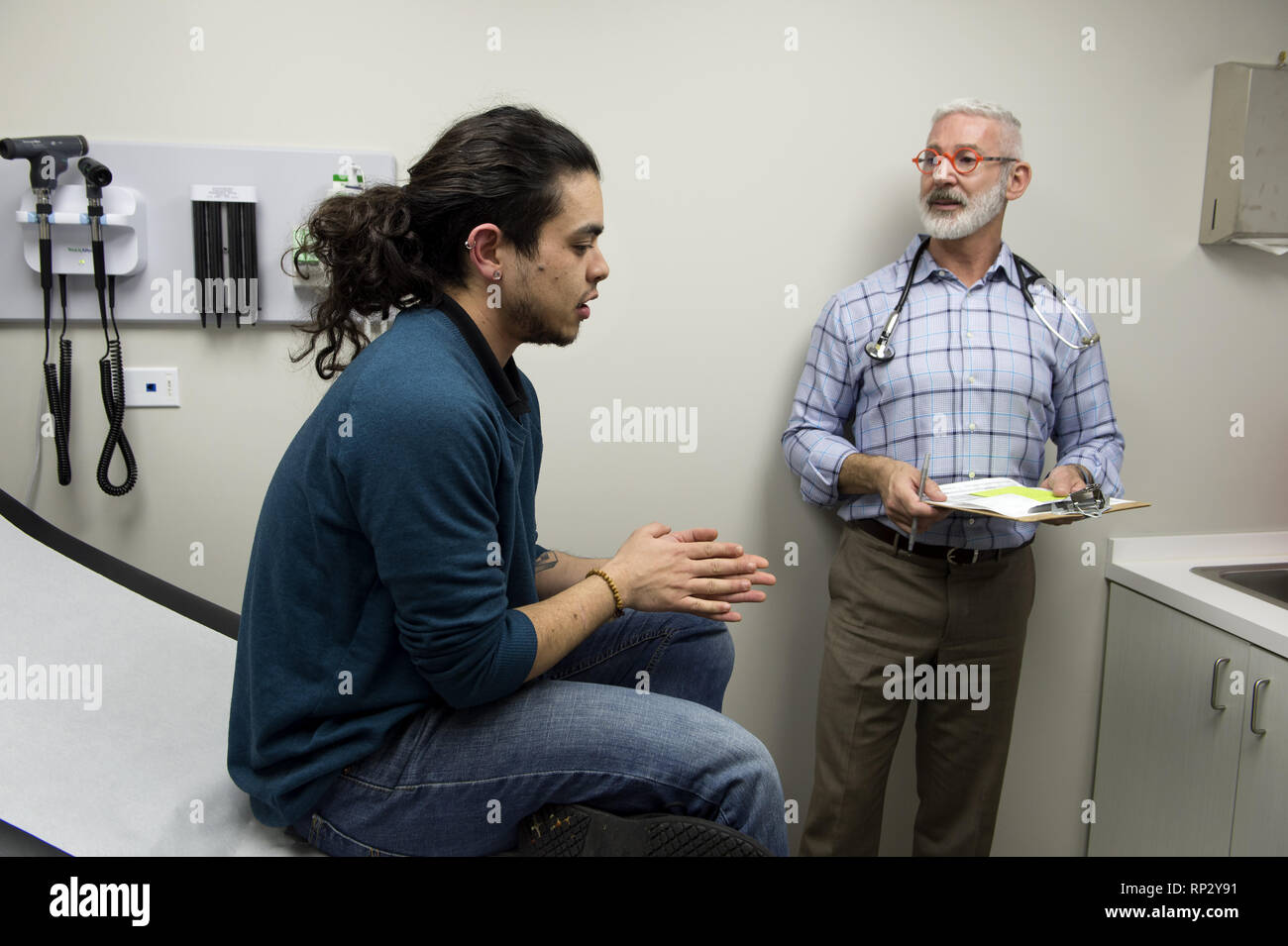 Atlanta, GA, USA. 19th Feb, 2019. TK Hadman, 30, is examined by Dr ...