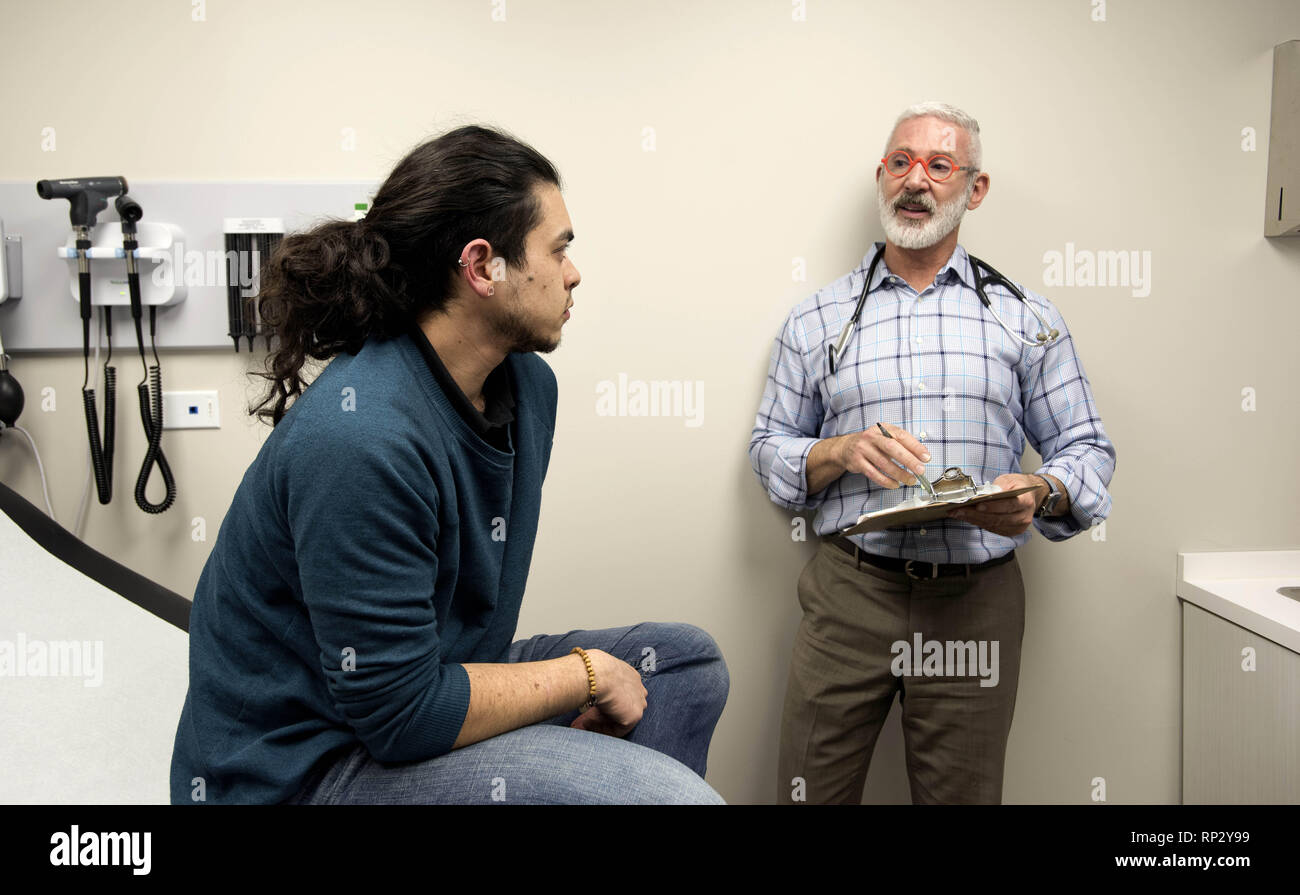 Atlanta, GA, USA. 19th Feb, 2019. TK Hadman, 30, is examined by Dr ...