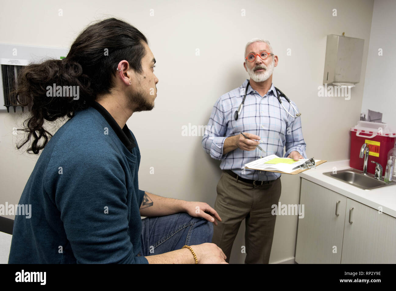Atlanta, GA, USA. 19th Feb, 2019. TK Hadman, 30, is examined by Dr ...