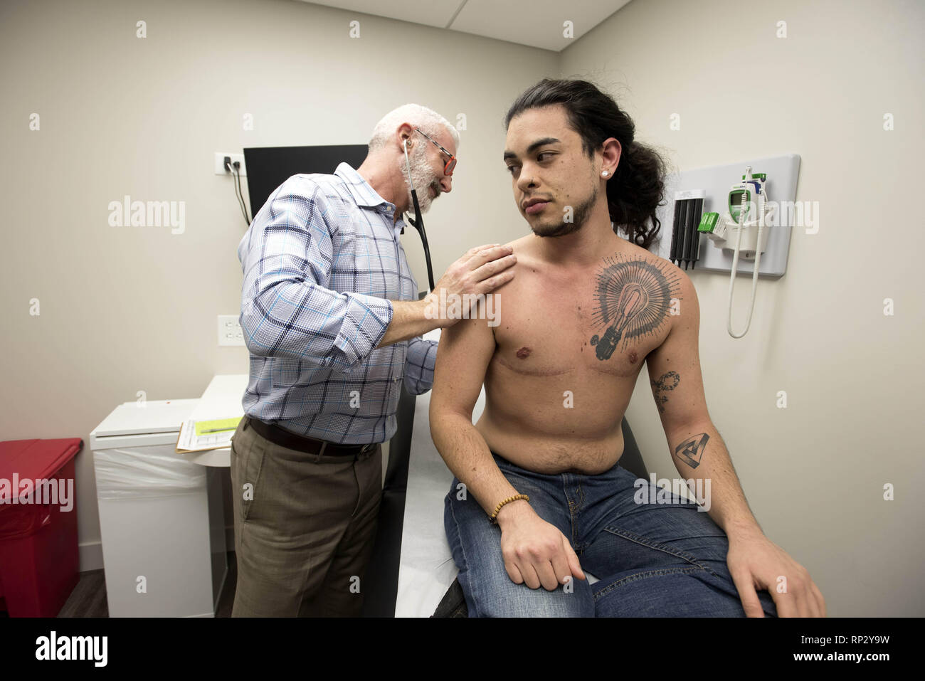 Atlanta, GA, USA. 19th Feb, 2019. TK Hadman, 30, is examined by Dr ...