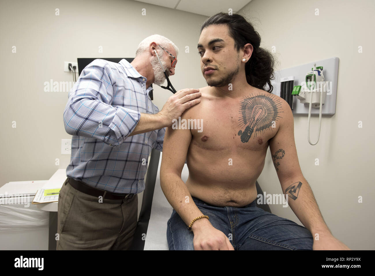 Atlanta, GA, USA. 19th Feb, 2019. TK Hadman, 30, is examined by Dr ...