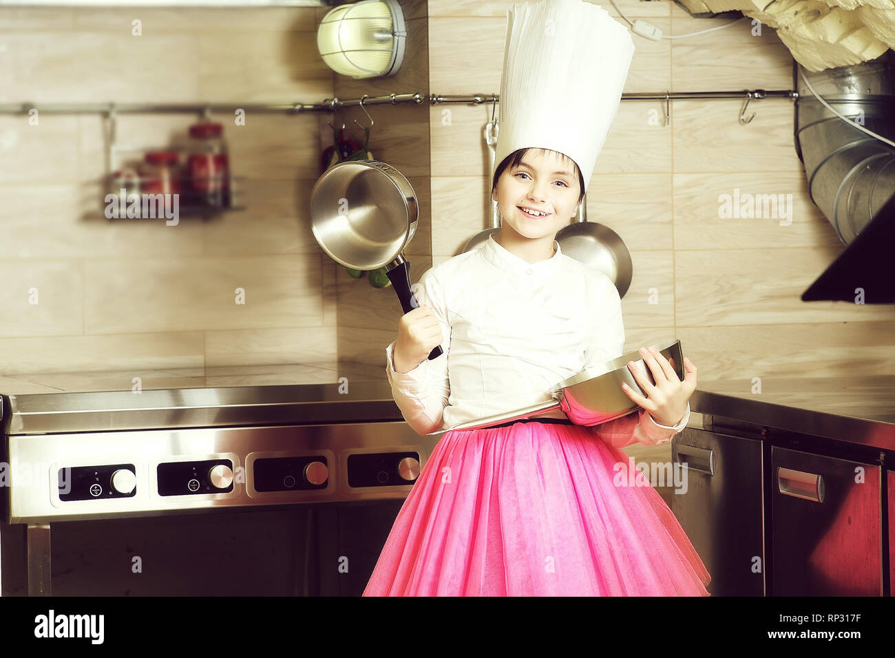 Little girl with pot Stock Photo - Alamy