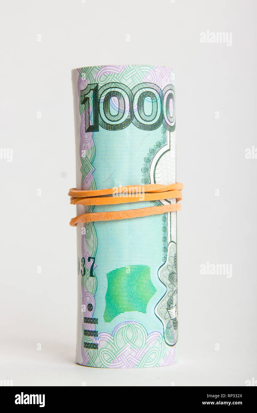 banknotes rolled into a tube Stock Photo - Alamy