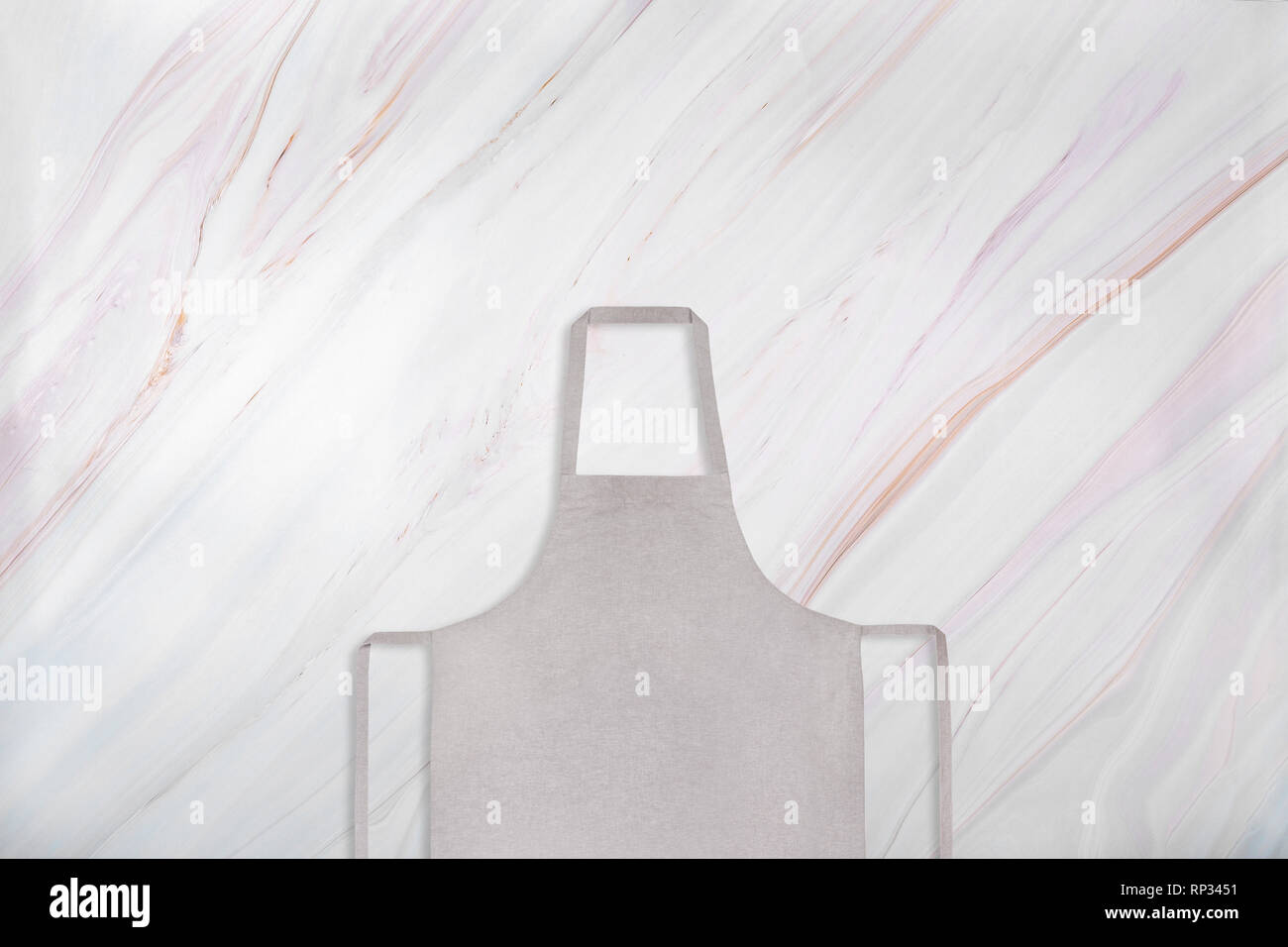 Gray apron on marble background. Flat lay Stock Photo - Alamy