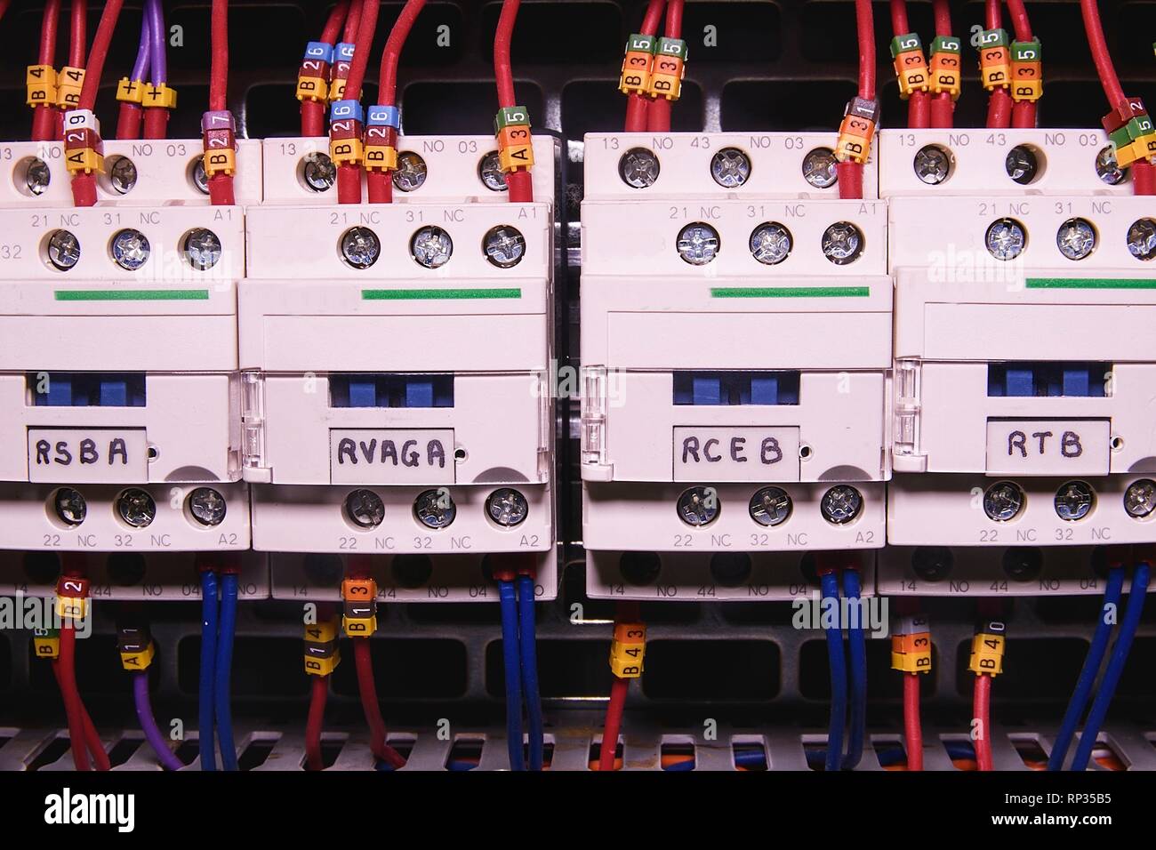 Image shows control cubicle. Electric contactors inside power case ...