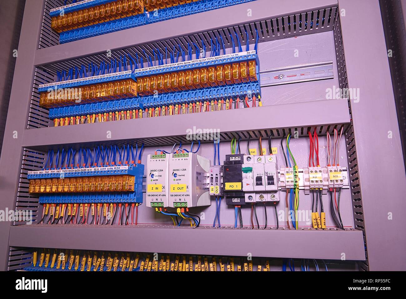 Relay actuators and terminal blocks inside the industrial power case ...