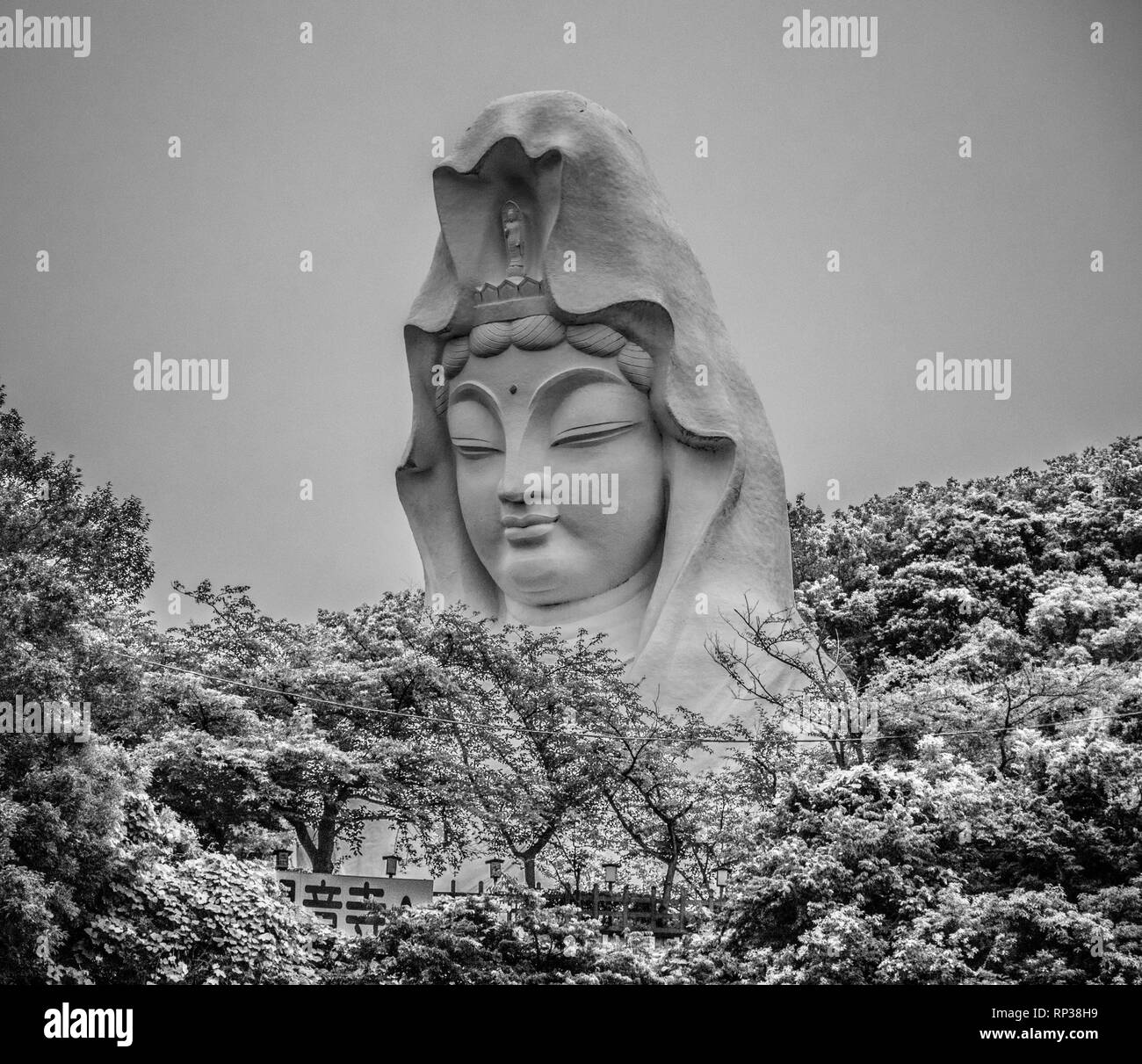 The huge sculpture of Ofuna Kannon on the hill Stock Photo - Alamy