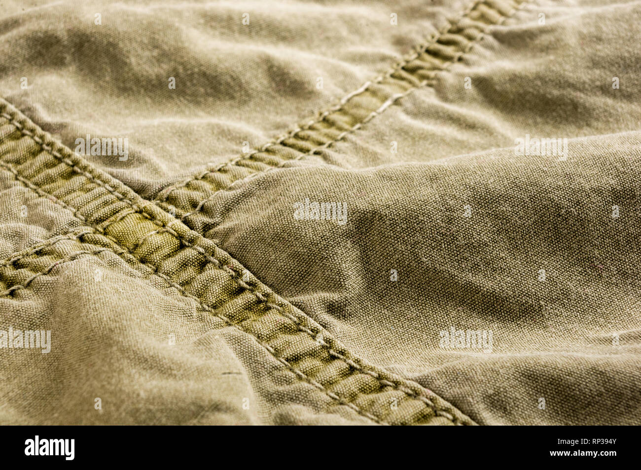 clothing items washed cotton fabric texture with seams, macro, close-up ...