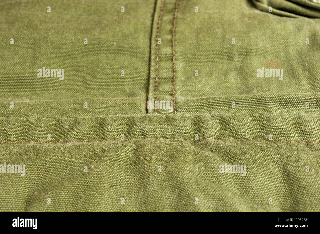 clothing items washed cotton fabric texture with seams, macro, close-up ...