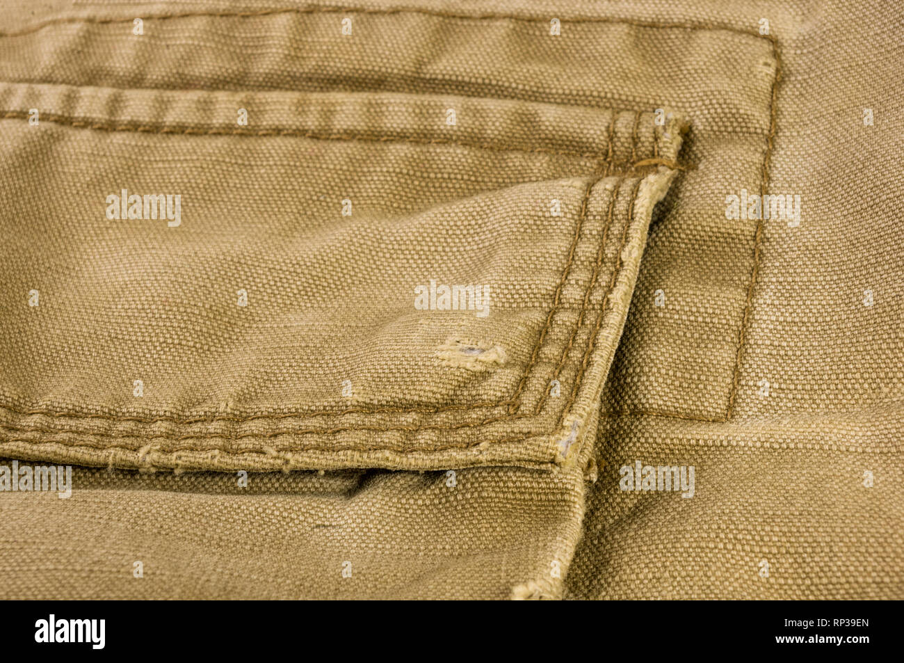clothing items washed cotton fabric texture with seams, macro, close-up ...