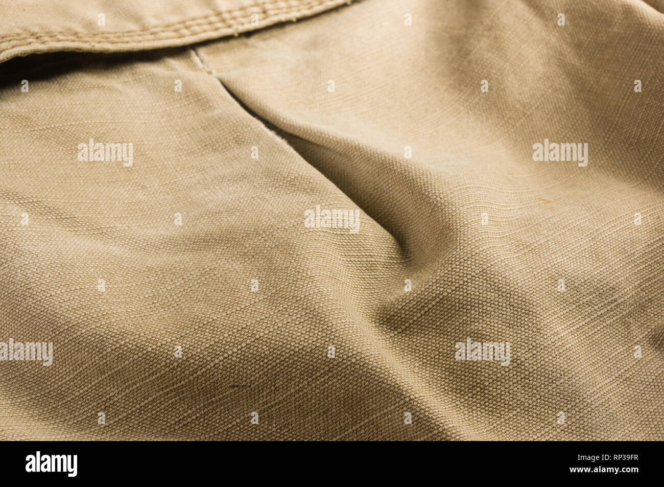 clothing items washed cotton fabric texture with seams, macro, close-up ...