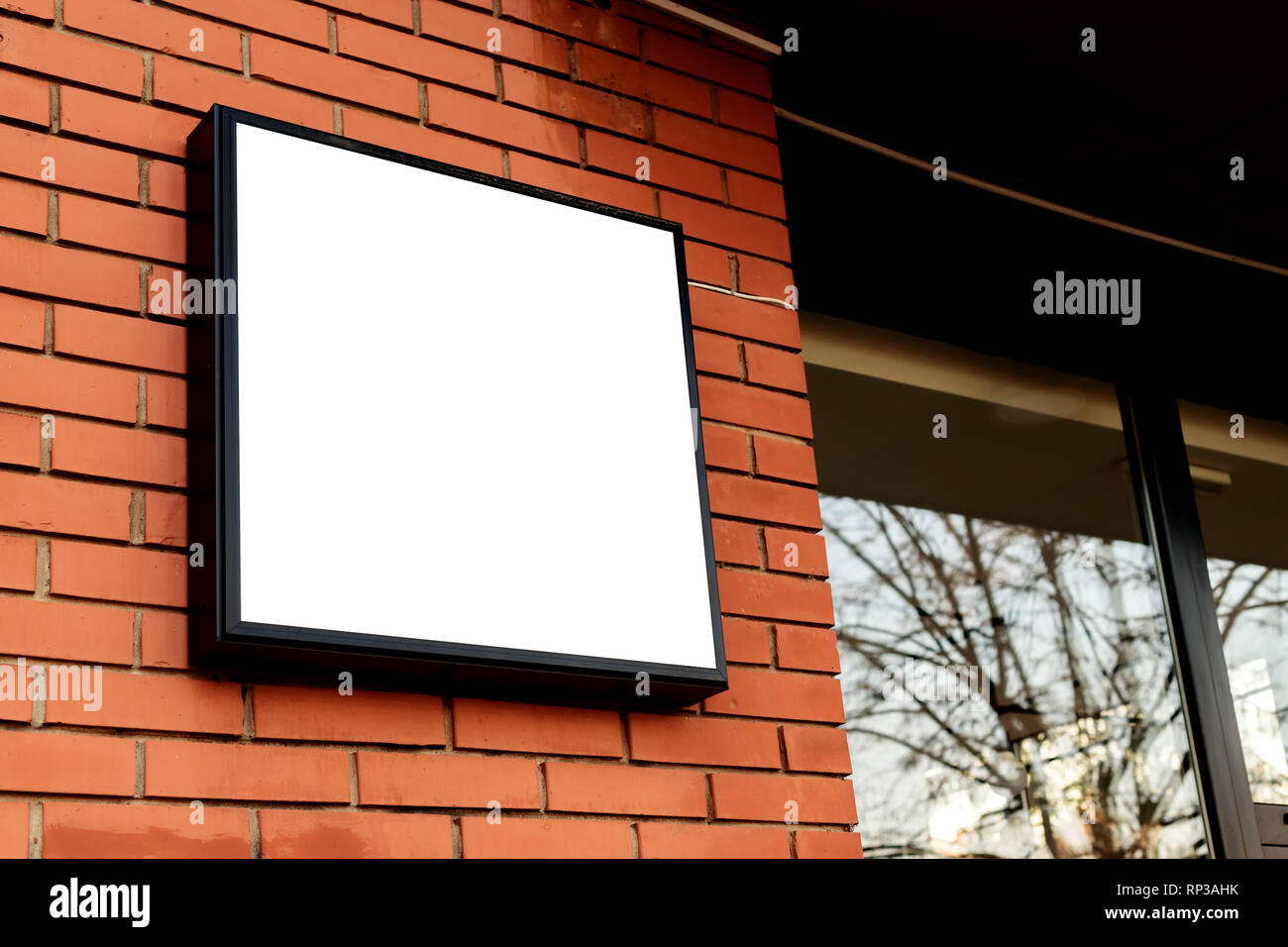 Blank square signboard, business light up sign mock up mounted on the ...