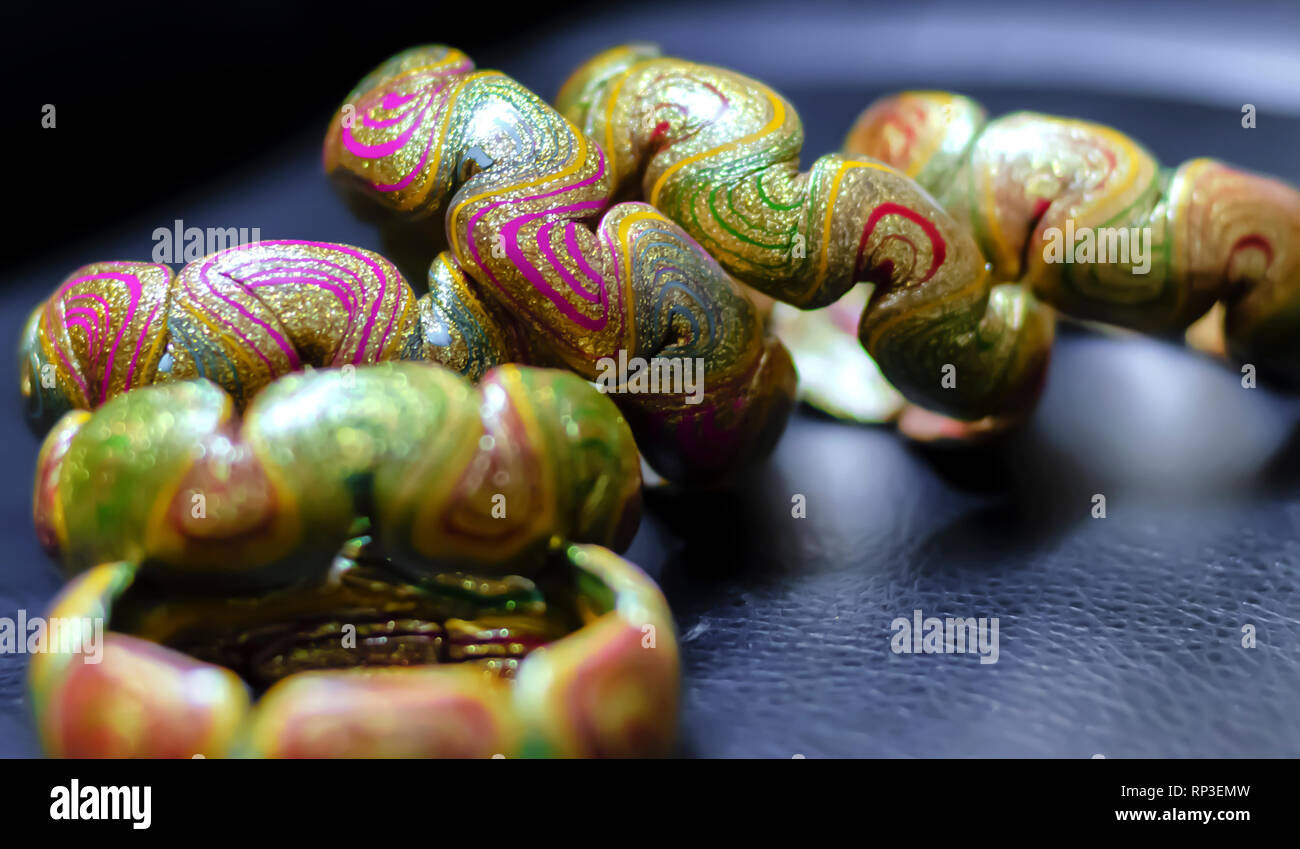 An collection of handmade colourful/colorful lac/lacquer/enamel/acrylic ...