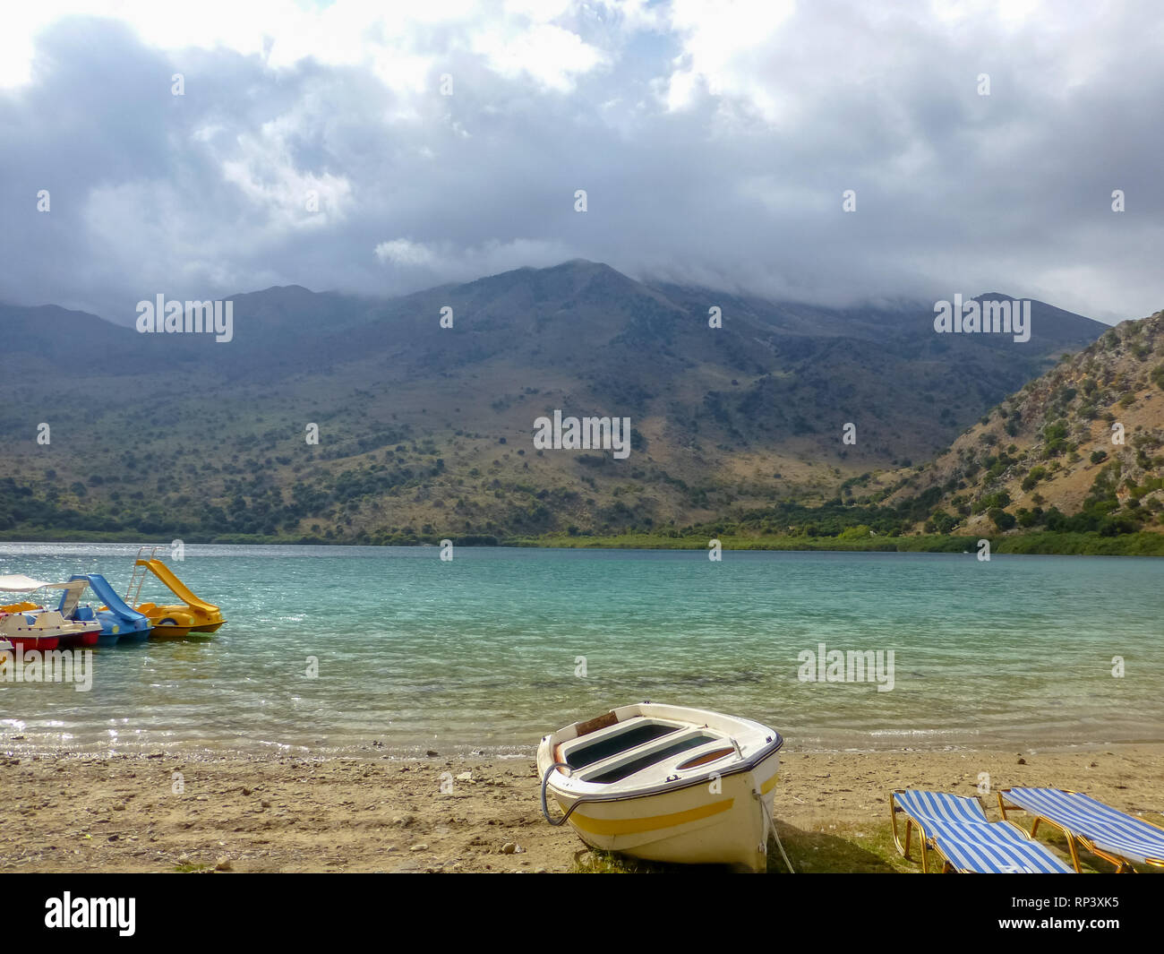 Freshwater lake Kournas with recreation equipment in Crete island ...