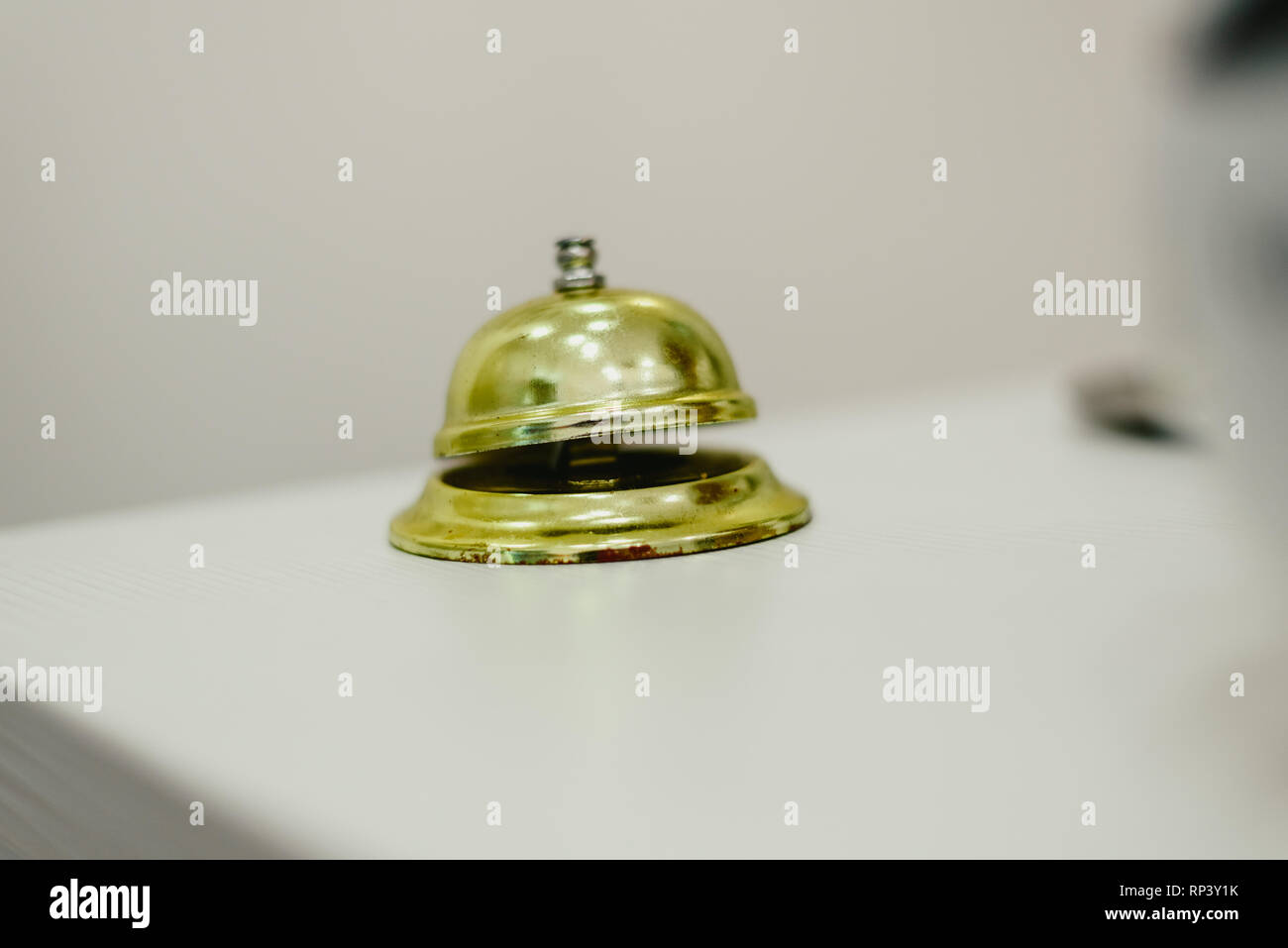 Old bell to call the bellman in a hotel, Service bell hotel golden ...