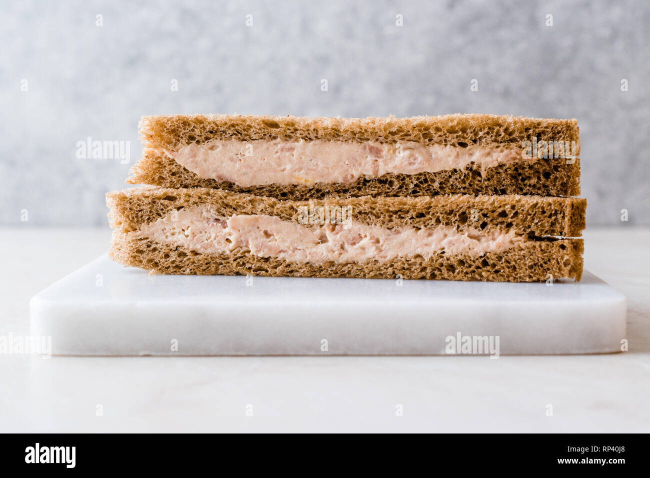 Triangle Light Sandwich with Tuna Fish Paste on Marble Board. Fast food ...