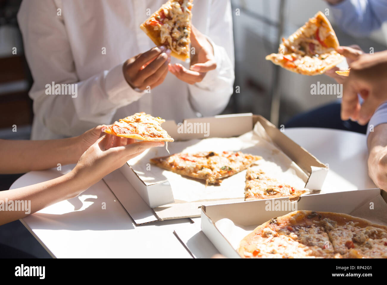 Office employees eating hi-res stock photography and images - Alamy