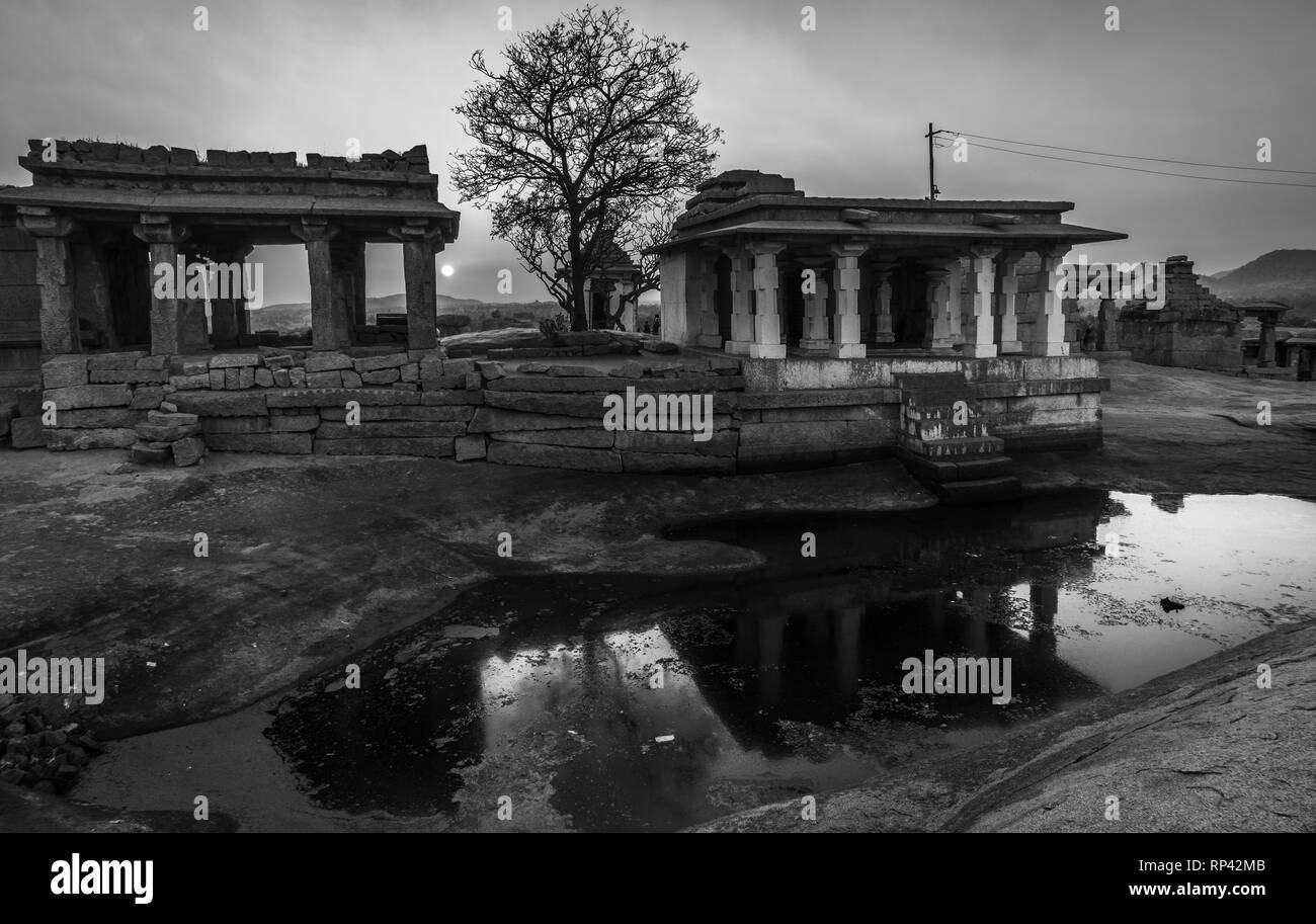 hampi karnakata india temple and silhouette tree at sunset point ...