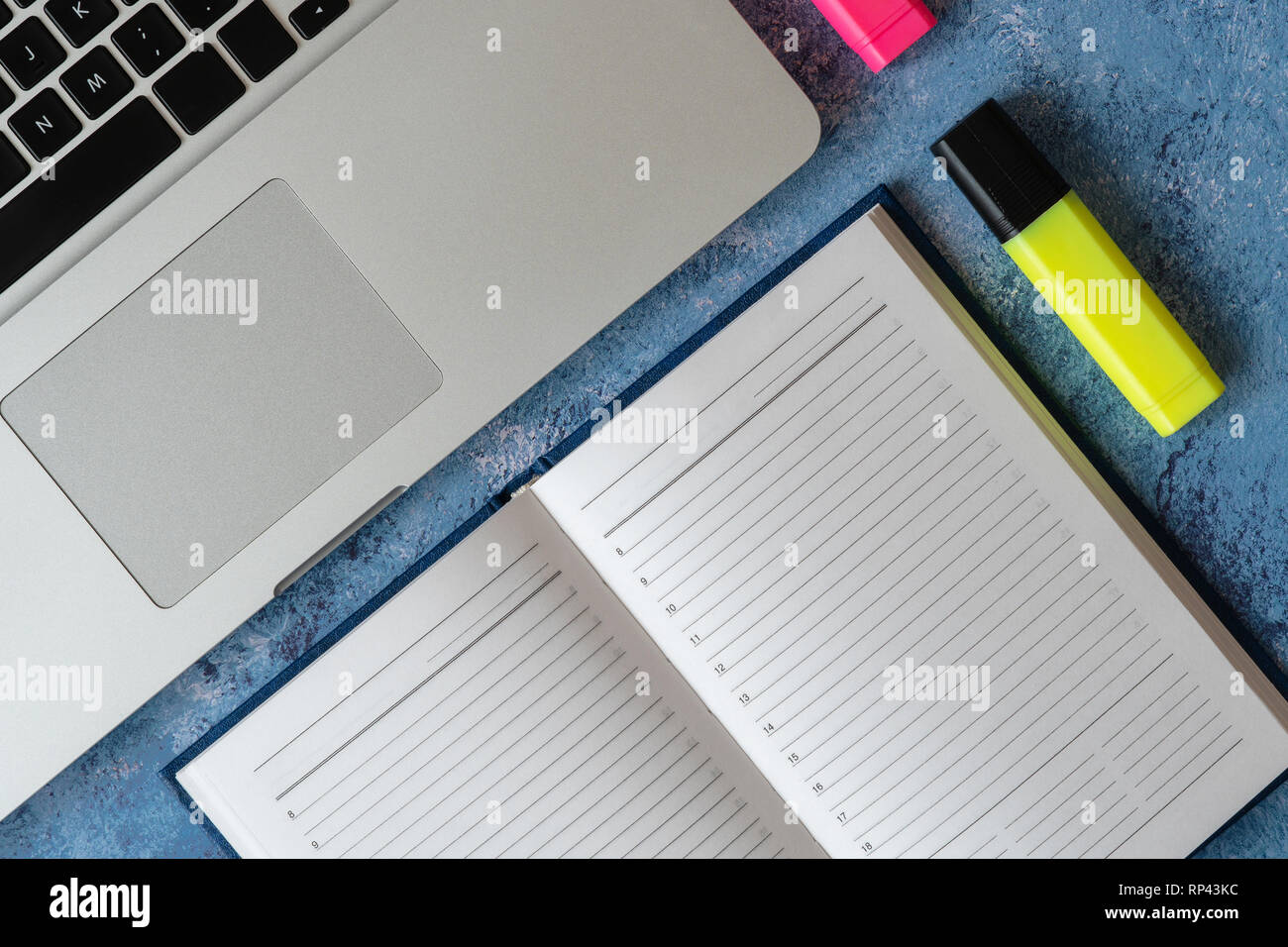 Opened clean business notebook and laptop. Business notebook for record ...