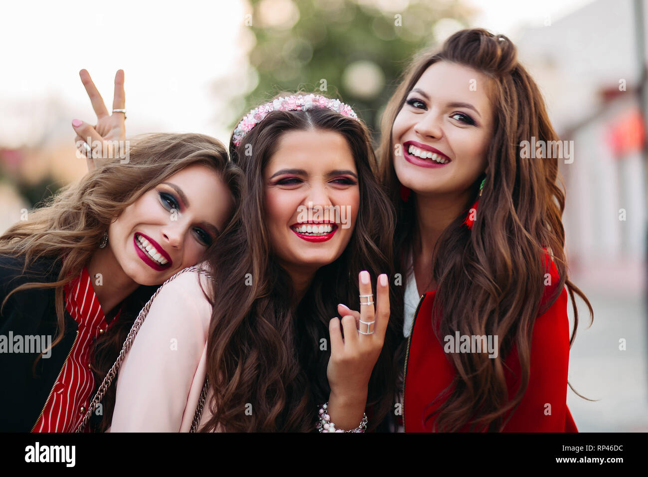 Group of gorgeous girlfriends smiling and gesturing at camera Stock ...