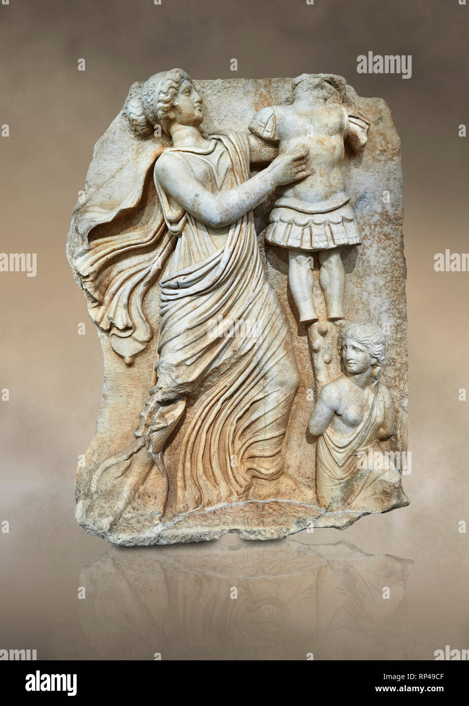 Roman Sebasteion relief sculpture of a Goddess inscribing a trophy ...