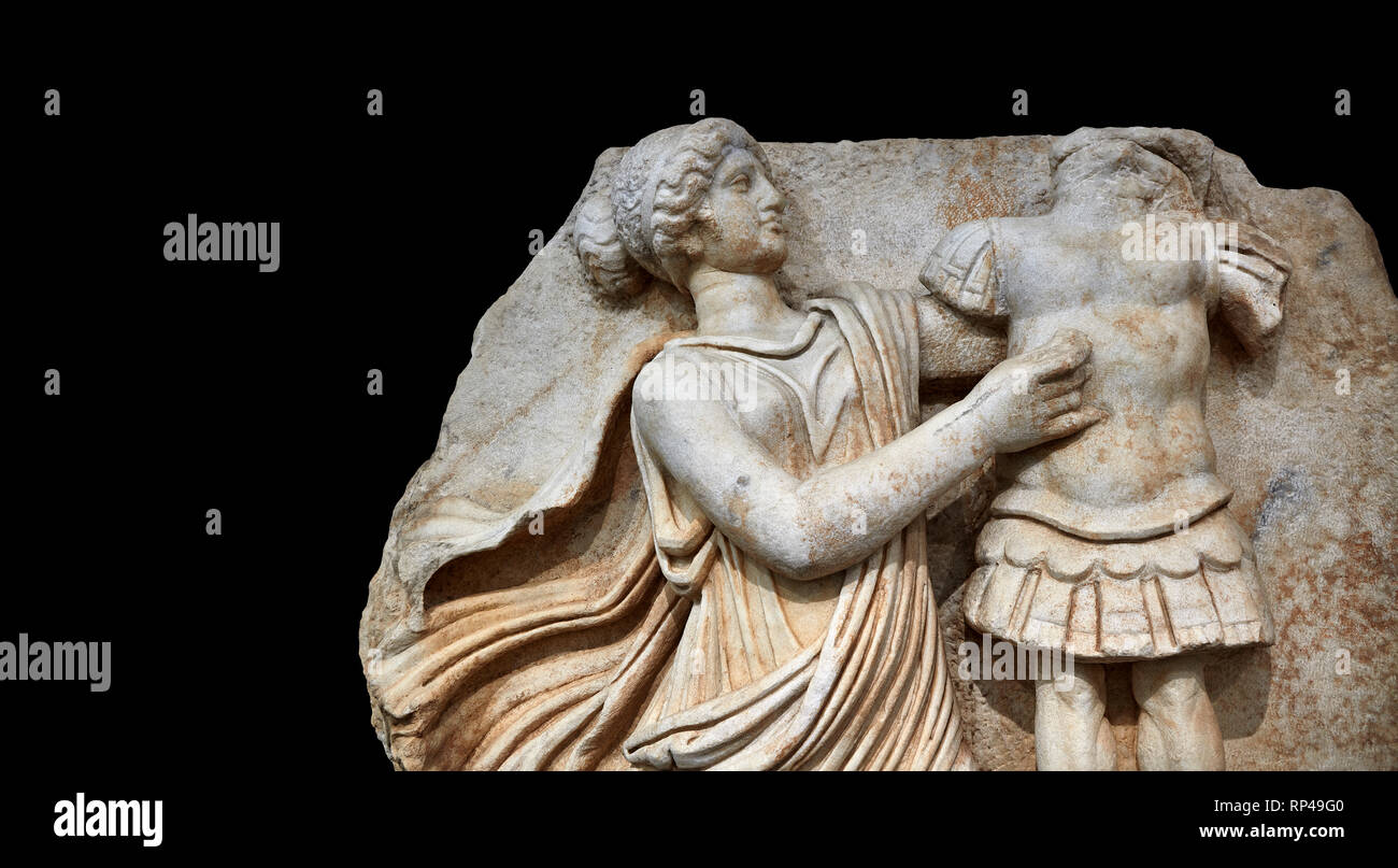 Close up of a Roman Sebasteion relief sculpture of a Goddess inscribing ...