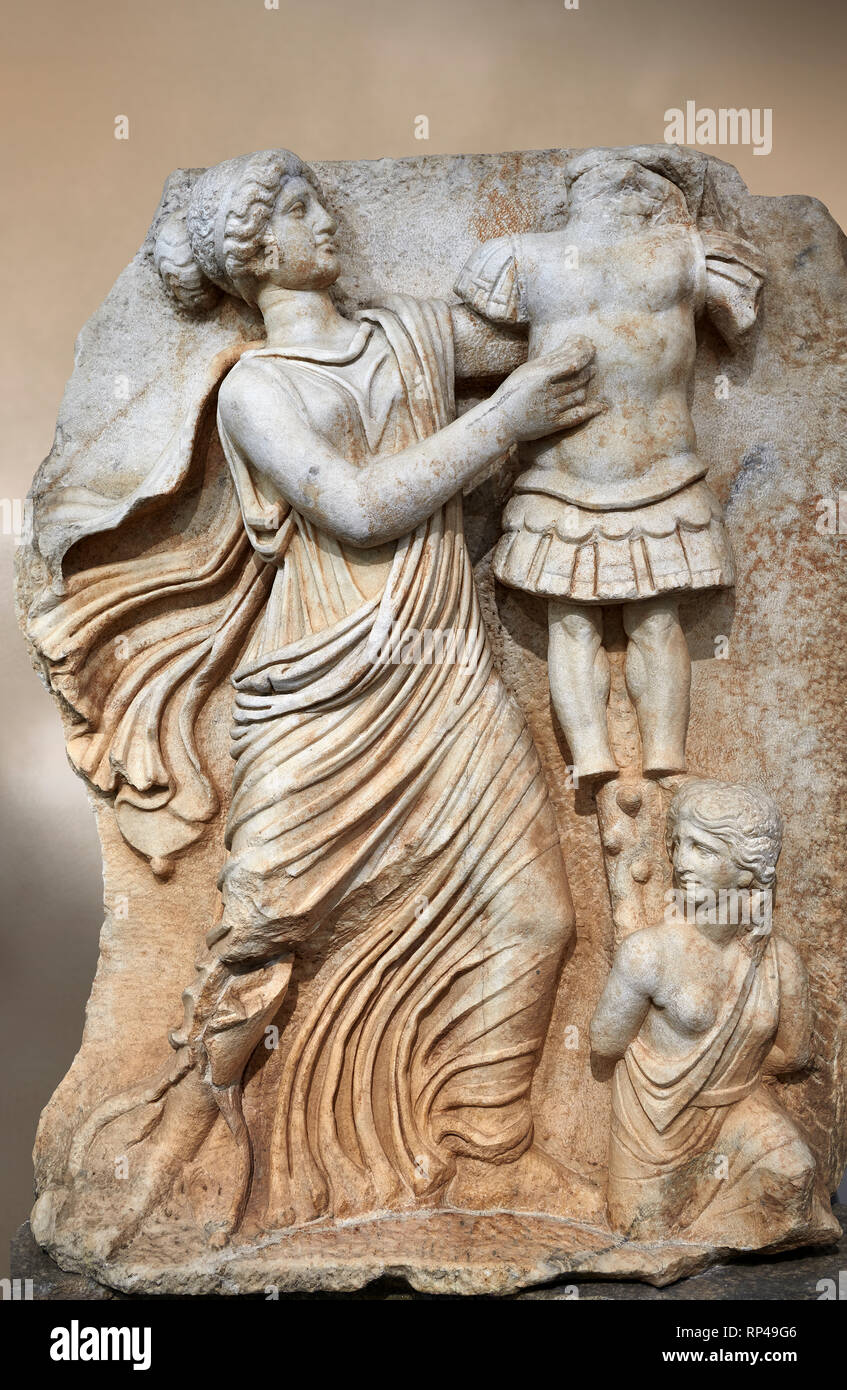 Roman Sebasteion relief sculpture of a Goddess inscribing a trophy ...