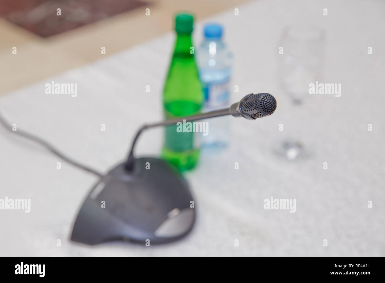 Microphone in the empty conference - meeting room . Intercom in the ...