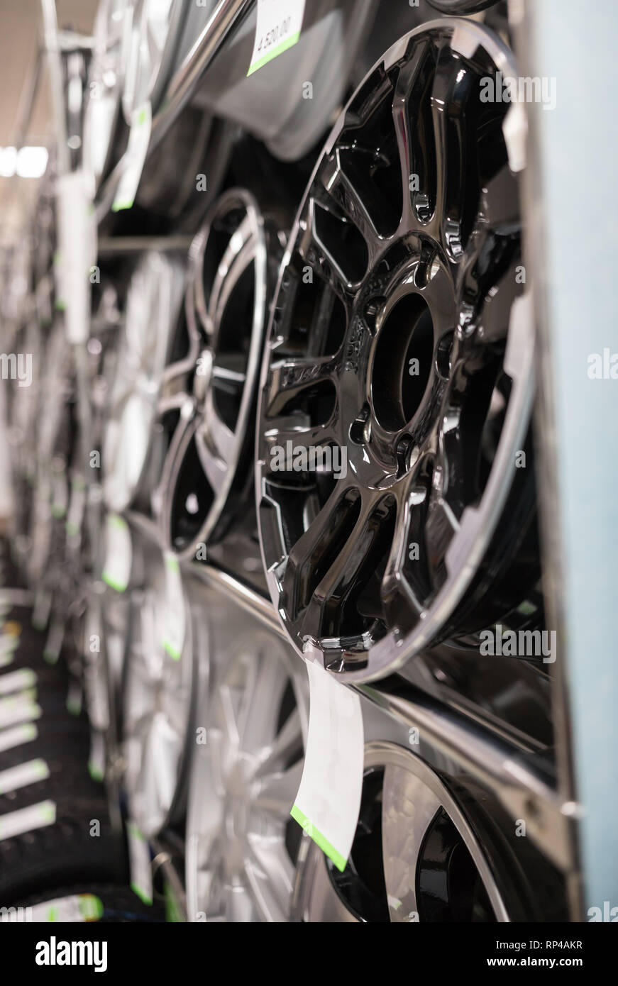 A car shop. Brand new clean modern rims on the shelf Stock Photo - Alamy