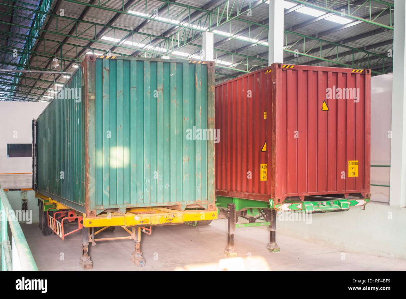 The container inside warehouse on shipment area Stock Photo - Alamy