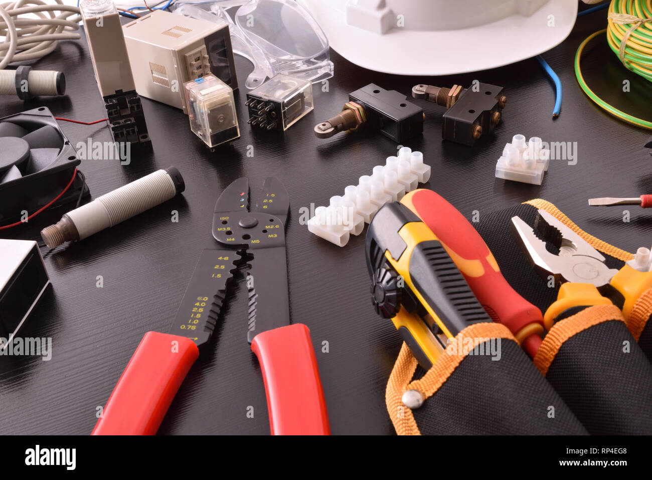 Black table with industrial equipment and tools for installation ...