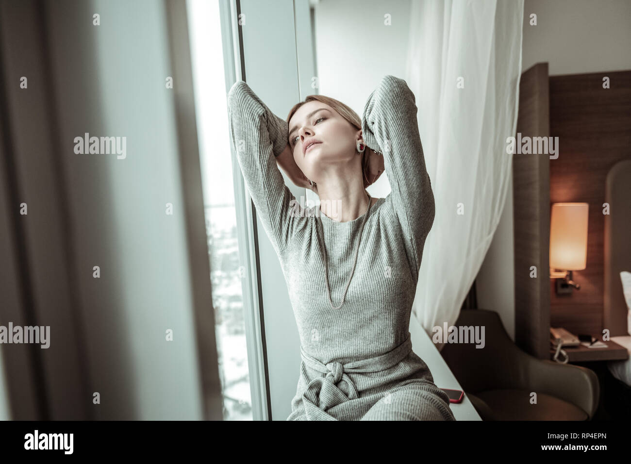 Young woman feeling exhausted after hard day in the office Stock Photo ...