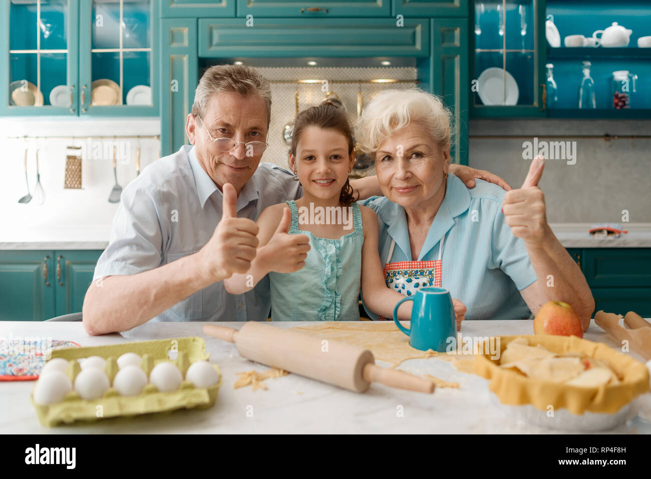 Grandpa, granddaughter and granny Stock Photo - Alamy