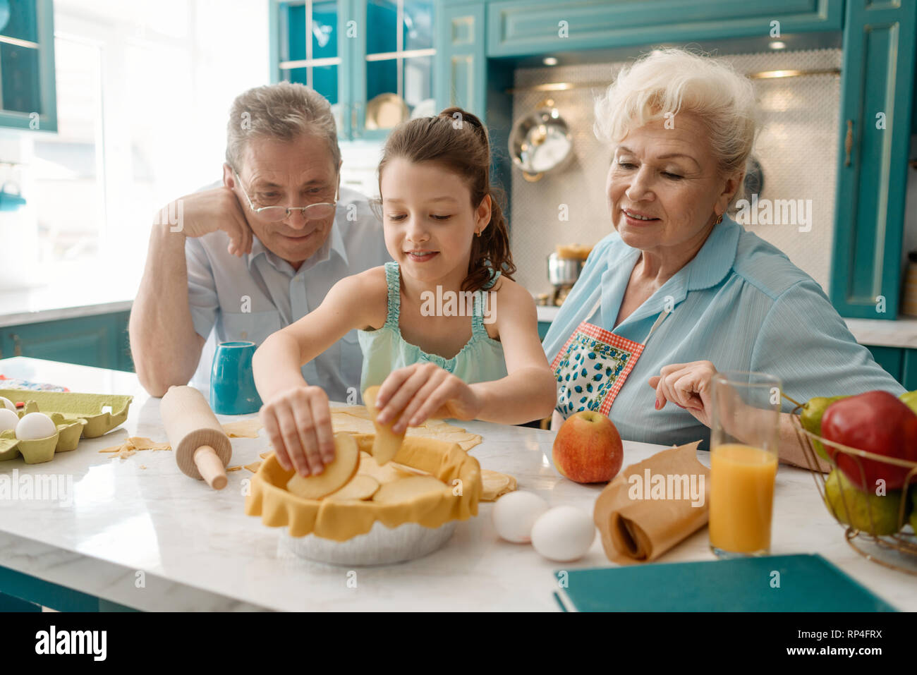Little helper in the kitchen Stock Photo - Alamy