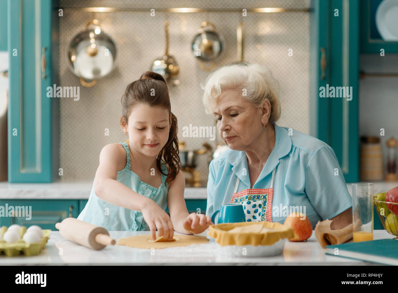 Child help elderly hi-res stock photography and images - Alamy