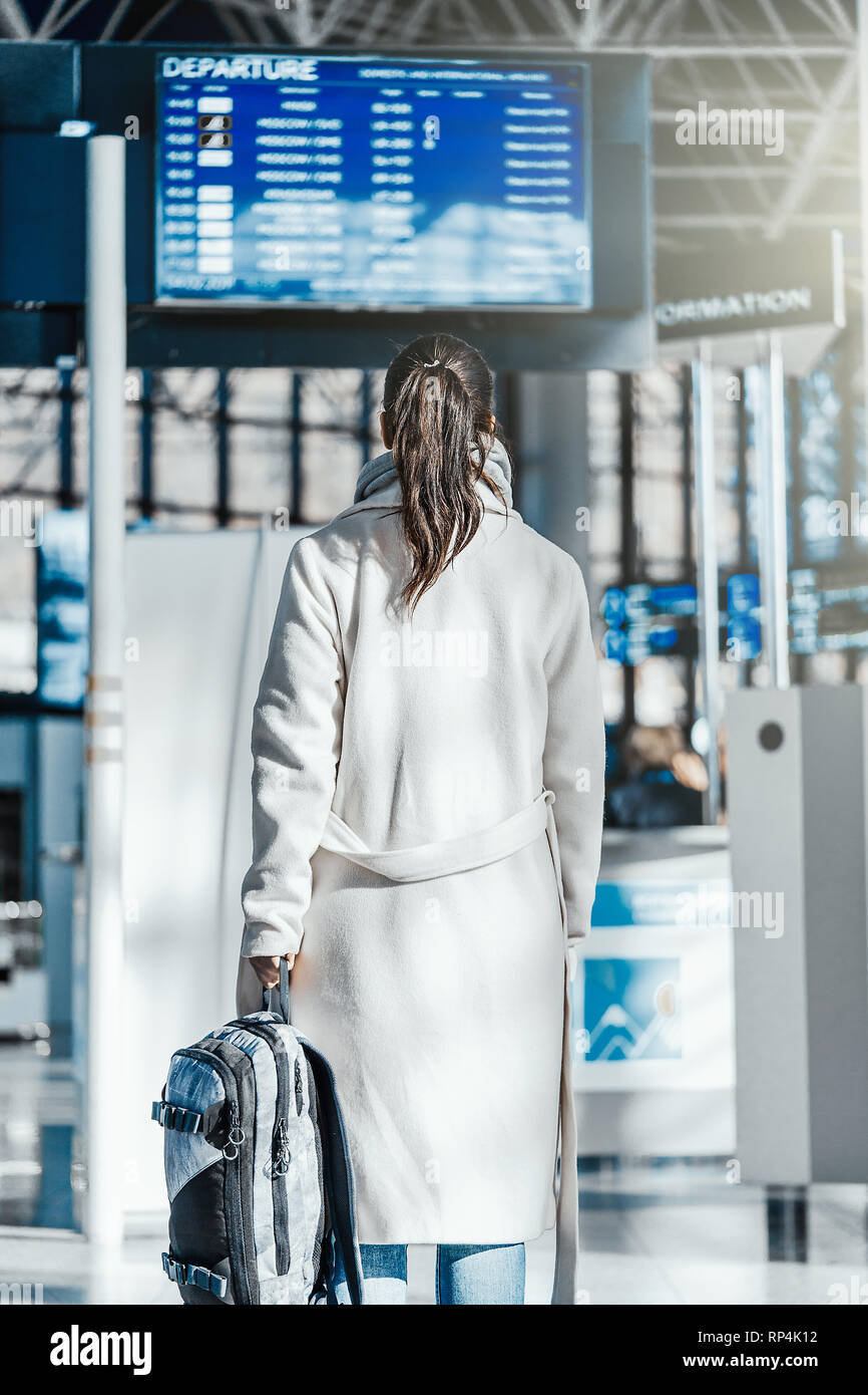 Beautiful girl brunette airport hi-res stock photography and images - Alamy
