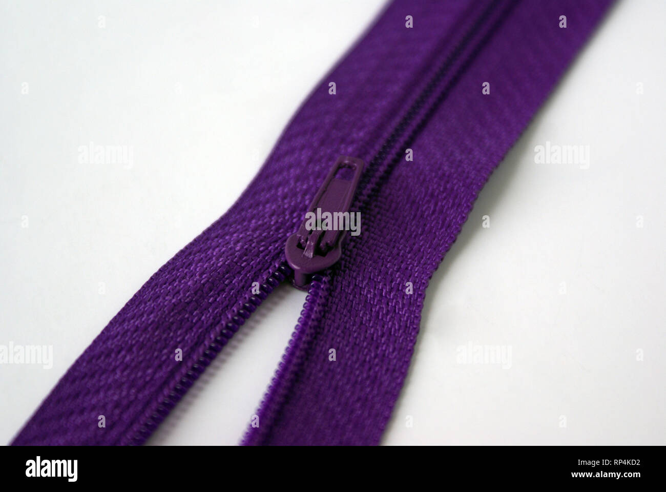 The Purple Zipper Stock Photo - Alamy