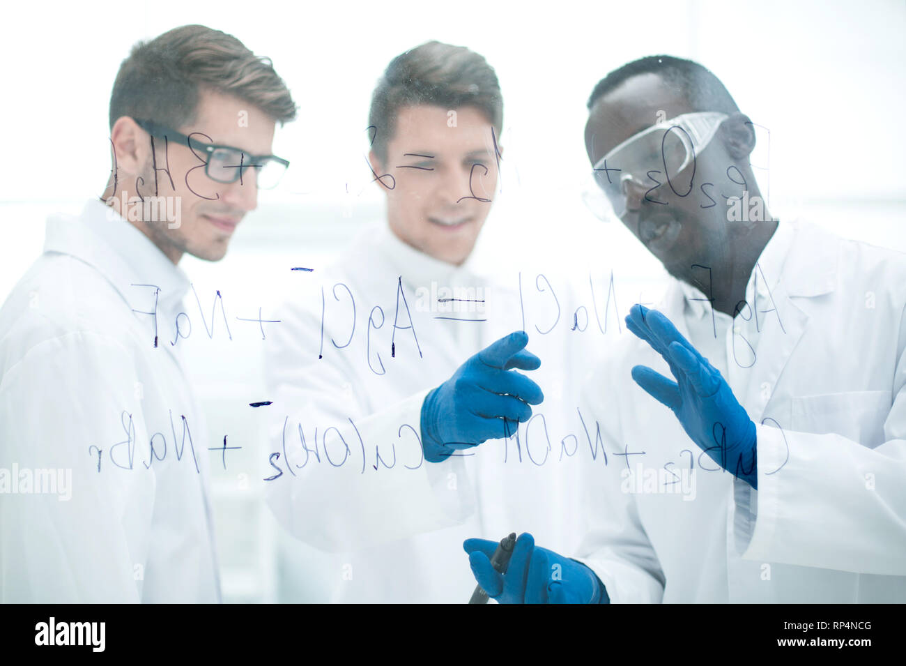 Scientists talk hi-res stock photography and images - Alamy