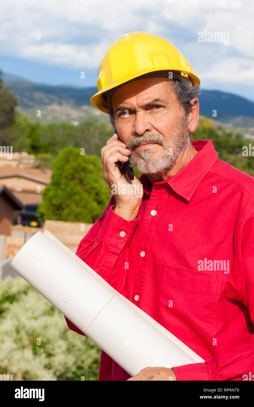 Architect, Contractor with Yellow Hard Hat portrait Stock Photo - Alamy