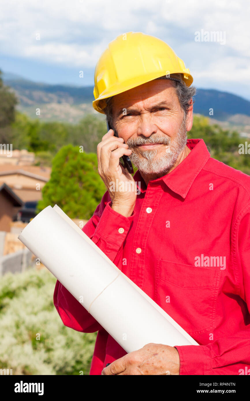 Architect, Contractor with Yellow Hard Hat portrait Stock Photo - Alamy