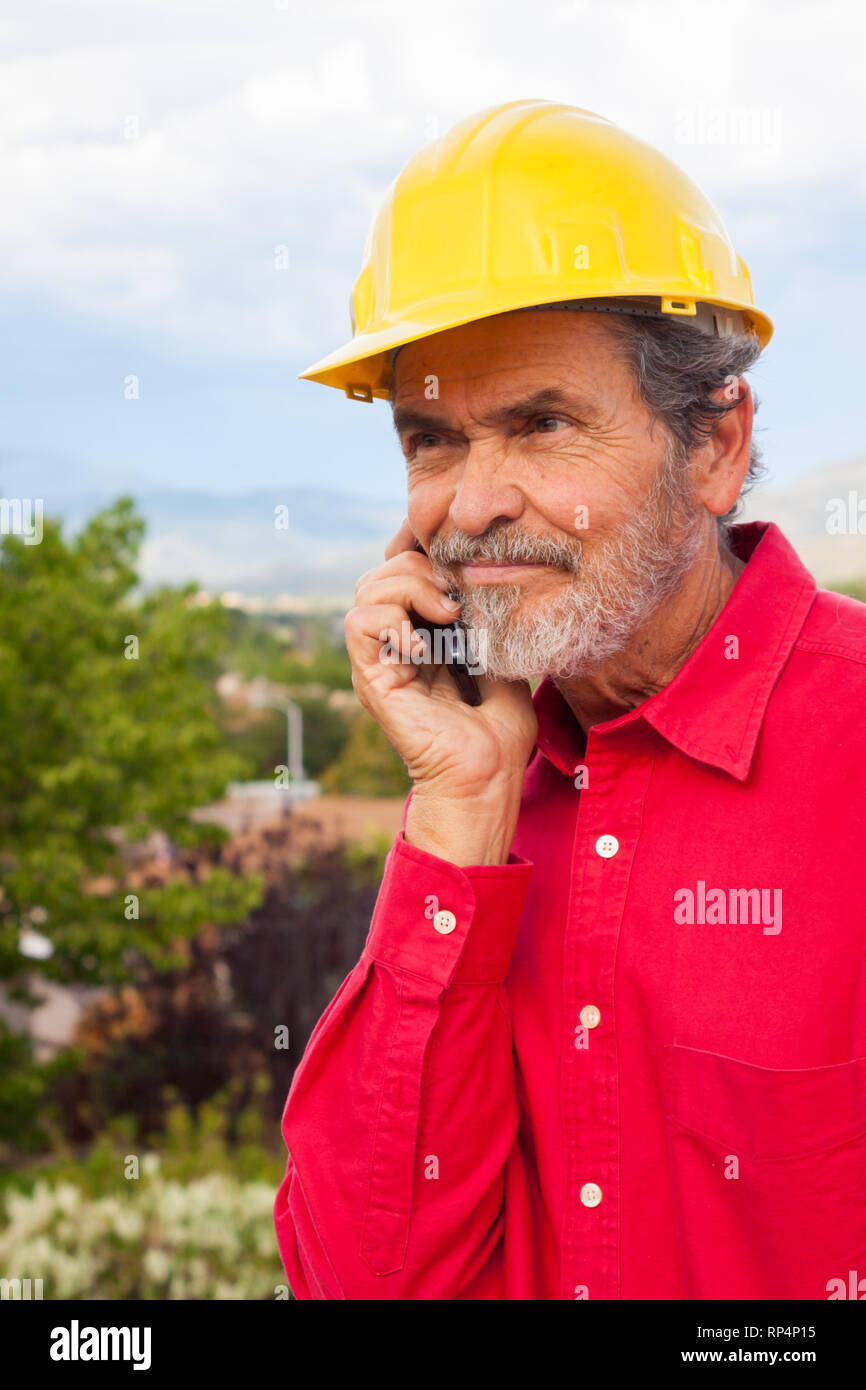 Architect, Contractor with Yellow Hard Hat portrait Stock Photo - Alamy