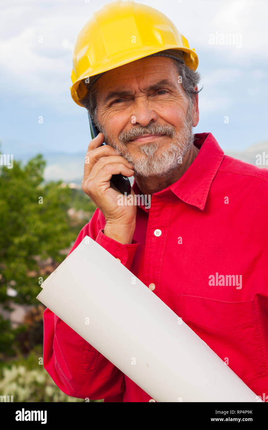 Architect, Contractor with Yellow Hard Hat portrait Stock Photo - Alamy