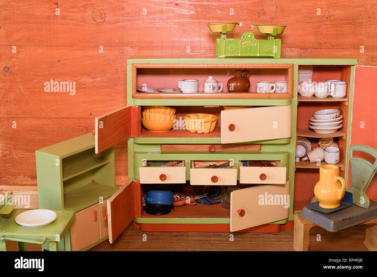 Vintage toys for girls. Wooden toy kitchen Stock Photo - Alamy