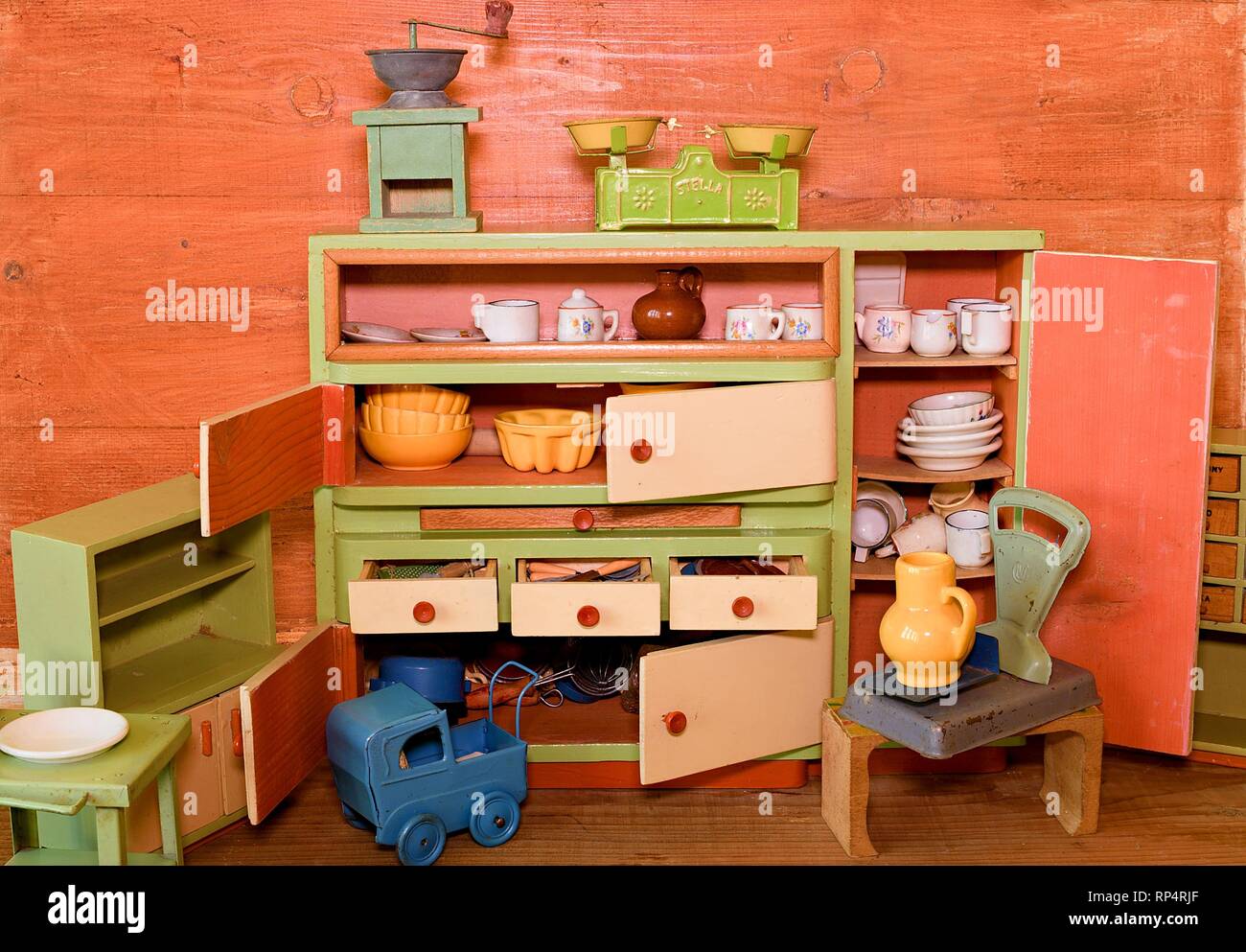 Vintage toys for girls. Wooden toy kitchen Stock Photo - Alamy