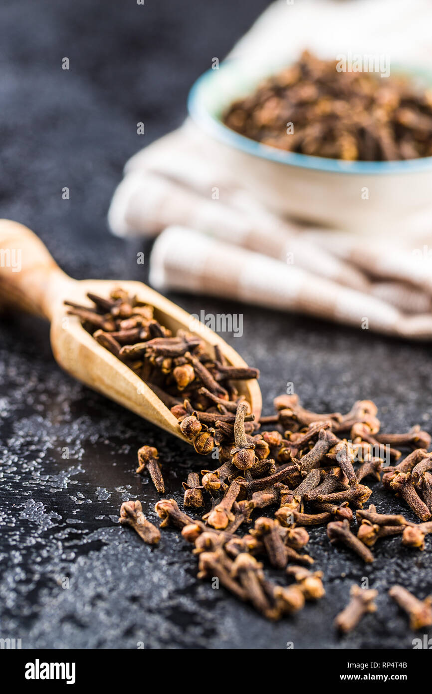 Carnation, dried clove spice in scoop Stock Photo - Alamy