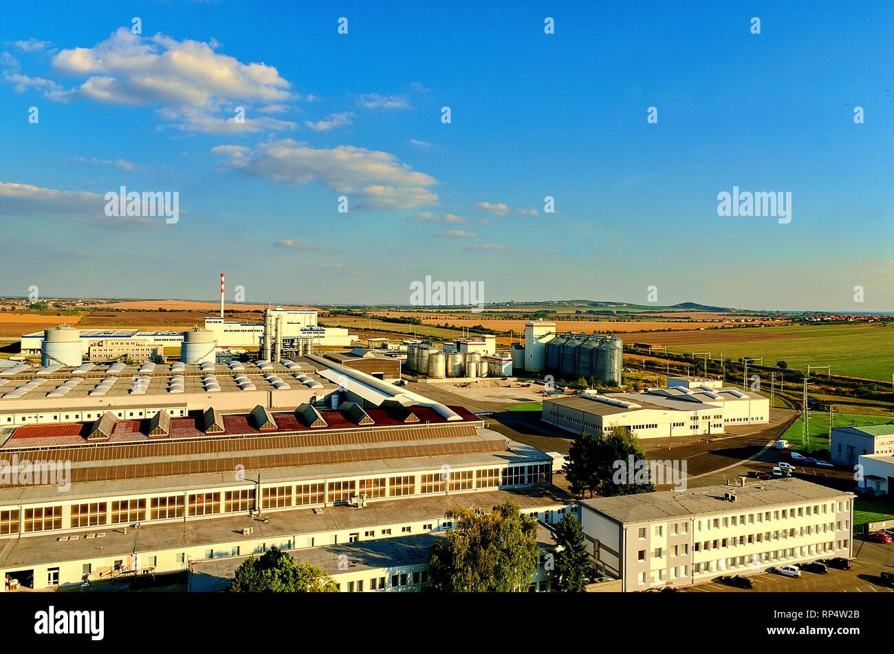 Aerial view of modern factory. Modern plant with blue sky Stock Photo ...