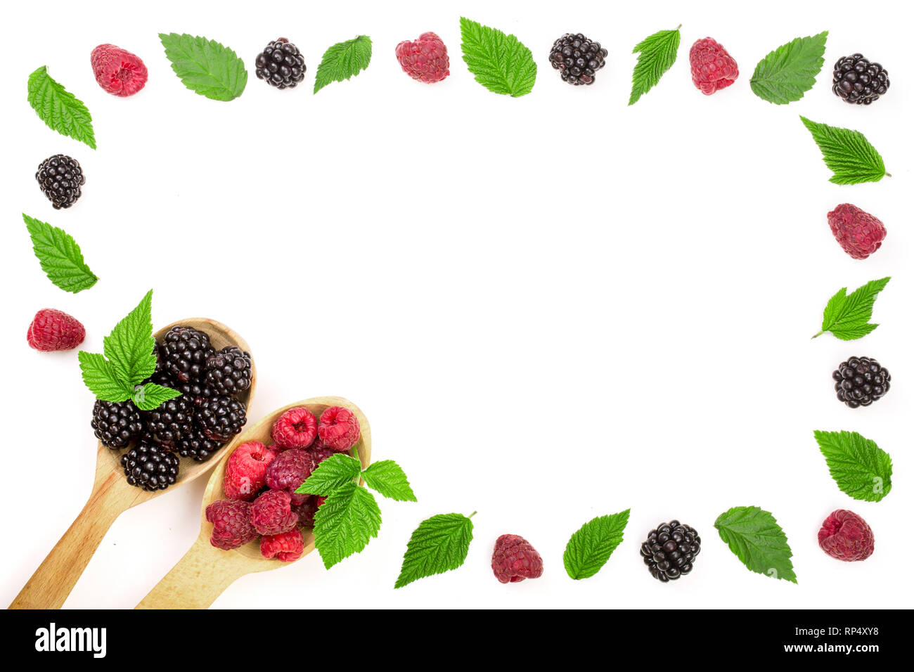 Raspberry blackberry frame isolated on white background with copy space ...