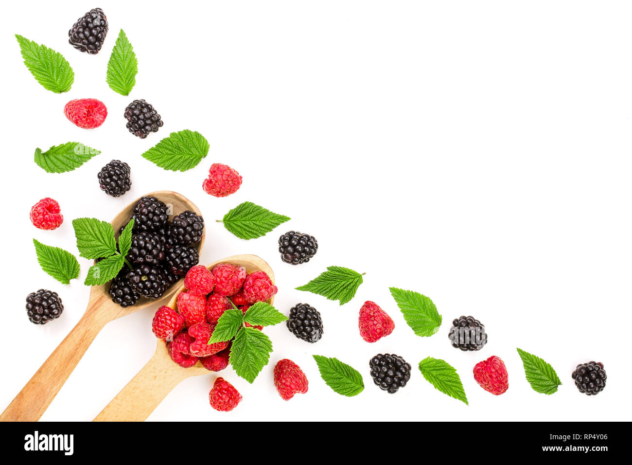 Raspberry blackberry frame isolated on white background with copy space ...